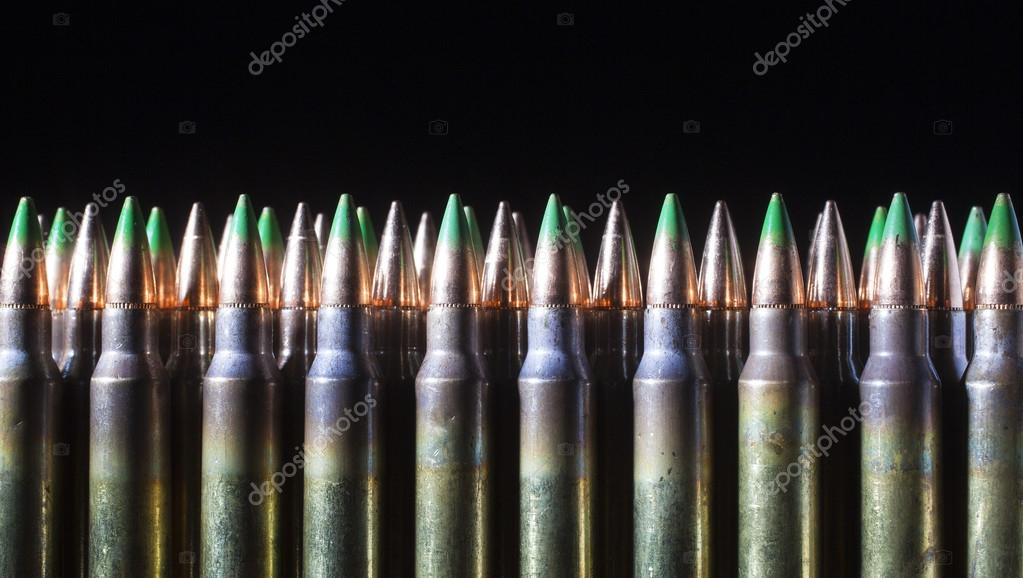 Bullets with green tips Stock Photo by ©gsagi 122565804