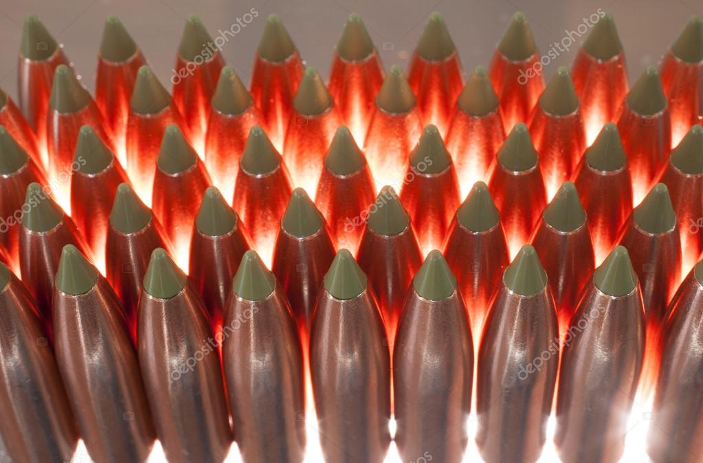 Bullet lineup with backlighting — Stock Photo © gsagi #123141426