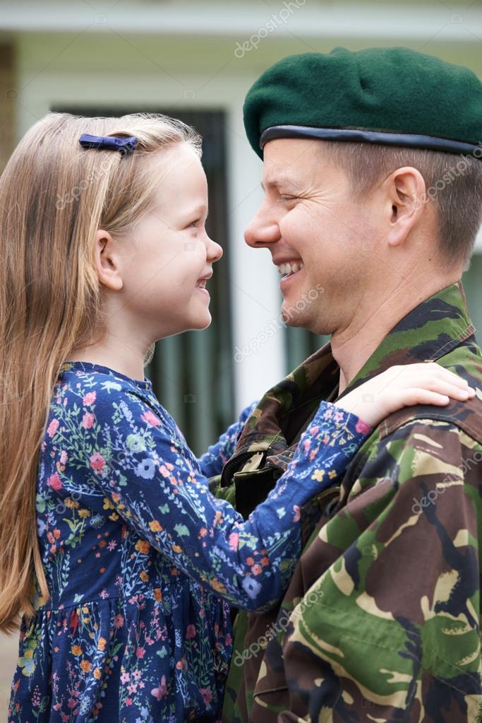 Soldier On Leave Hugging Daughter — Stock Photo © HighwayStarz #115981828