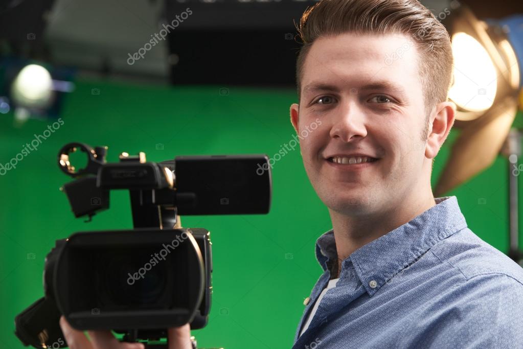 Male Camera Operator In Television Studio — Stock Photo © HighwayStarz ...