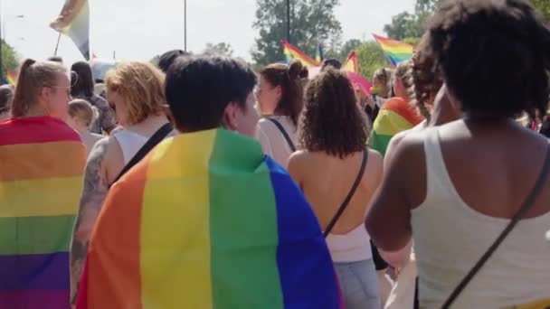 Pride parade Warsaw. Crowd of people in colorful clothing and with ...