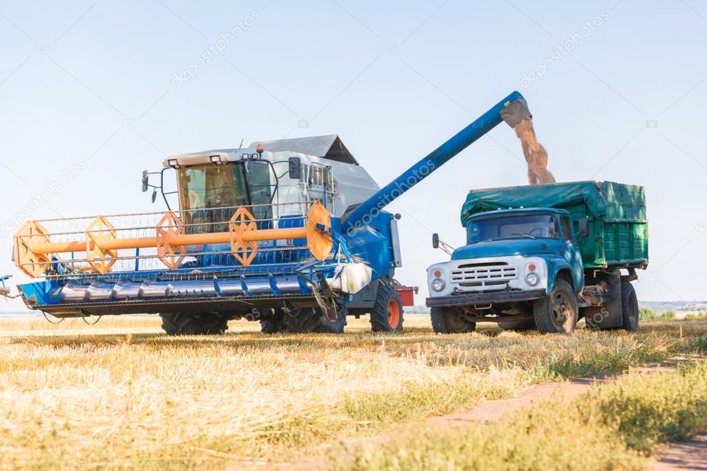 Combine harvester working — Stock Photo © erstudio #64921171 Combine harvester working — Stock Photo © erstudio #64921171