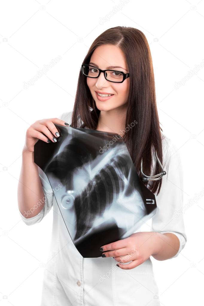 Doctor looking at x-ray — Stock Photo © erstudio #76124795 Doctor looking at x-ray — Stock Photo © erstudio #76124795