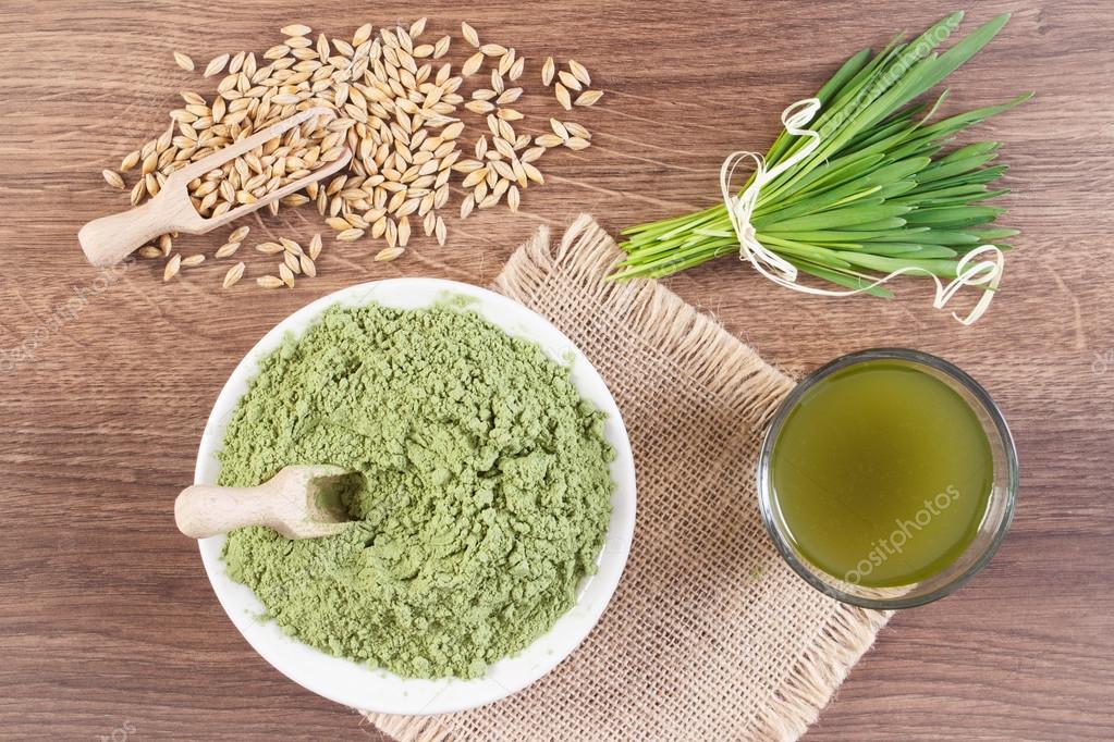 Young powder barley with grains and barley grass with beverage, body ...
