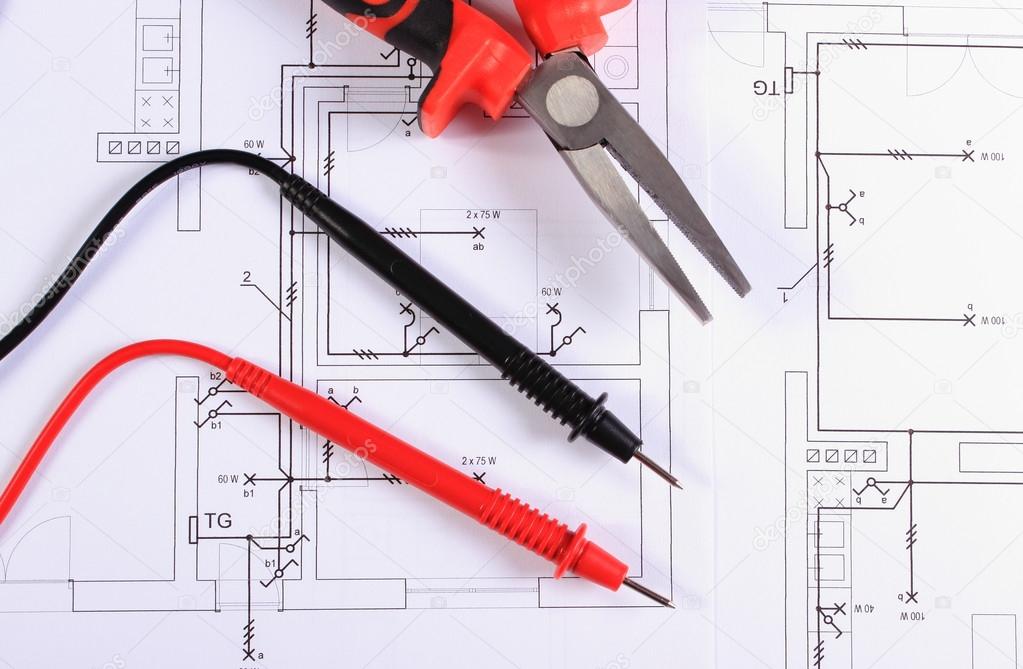 Cables of multimeter and work tool on construction drawing Stock Photo ...