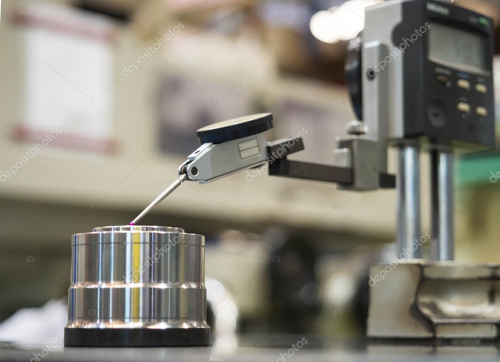 Operator inspection dimension of cnc turning parts Stock Photo by ...