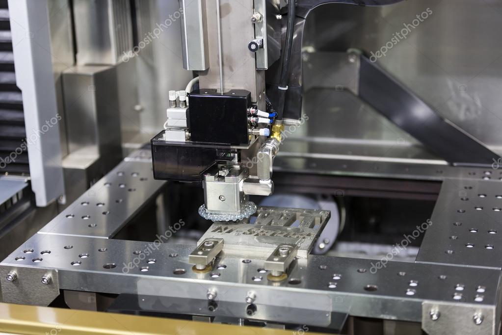 CNC wire cut machine cutting mold parts — Stock Photo © sorapol1150 ...