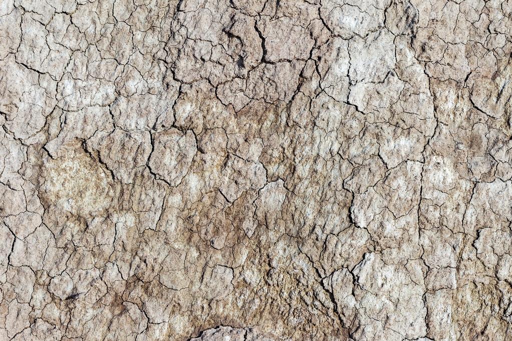 Fondo texturizado de la superficie de tierra agrietada seca. sequía en ...