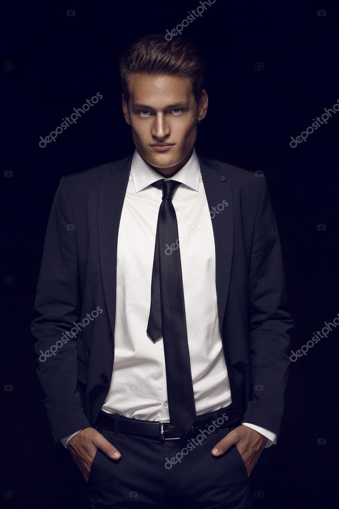 Cool businessman standing Stock Photo by ©_italo_ 52493985