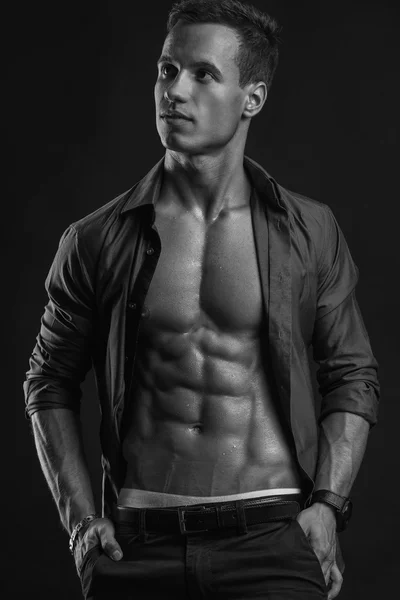 Strong Athletic Man Fitness Model Torso showing six pack abs. Stock Photo by ©_italo_ 57143195