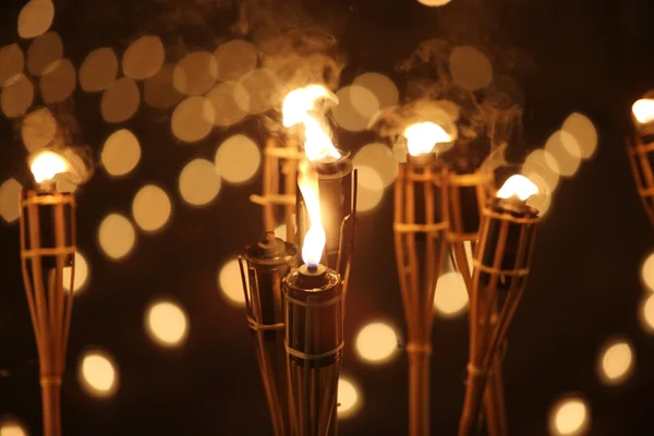 Torches at night Stock Photo by ©sociopat_mpat 90723614