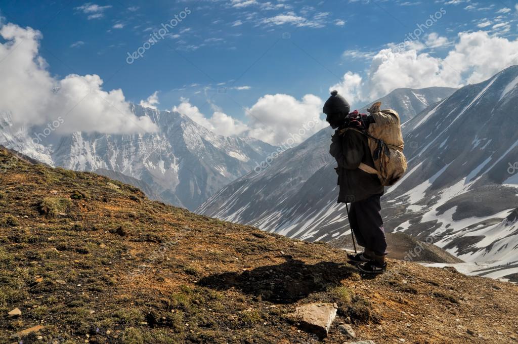 Sherpa in Himalayas — Stock Photo © MichalKnitl #63552323