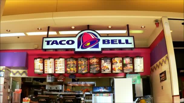 Taco Bell Menu Counter ⬇ Video by © Loganimages Stock Footage #70558439