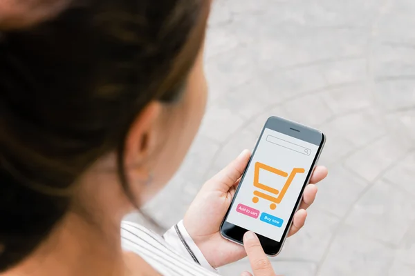 Close up woman use phone shopping online on thrid person view - Stock ...