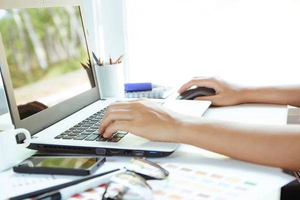 Female graphic designer using tablet pen Stock Photo by ©OtnaYdur 11034469