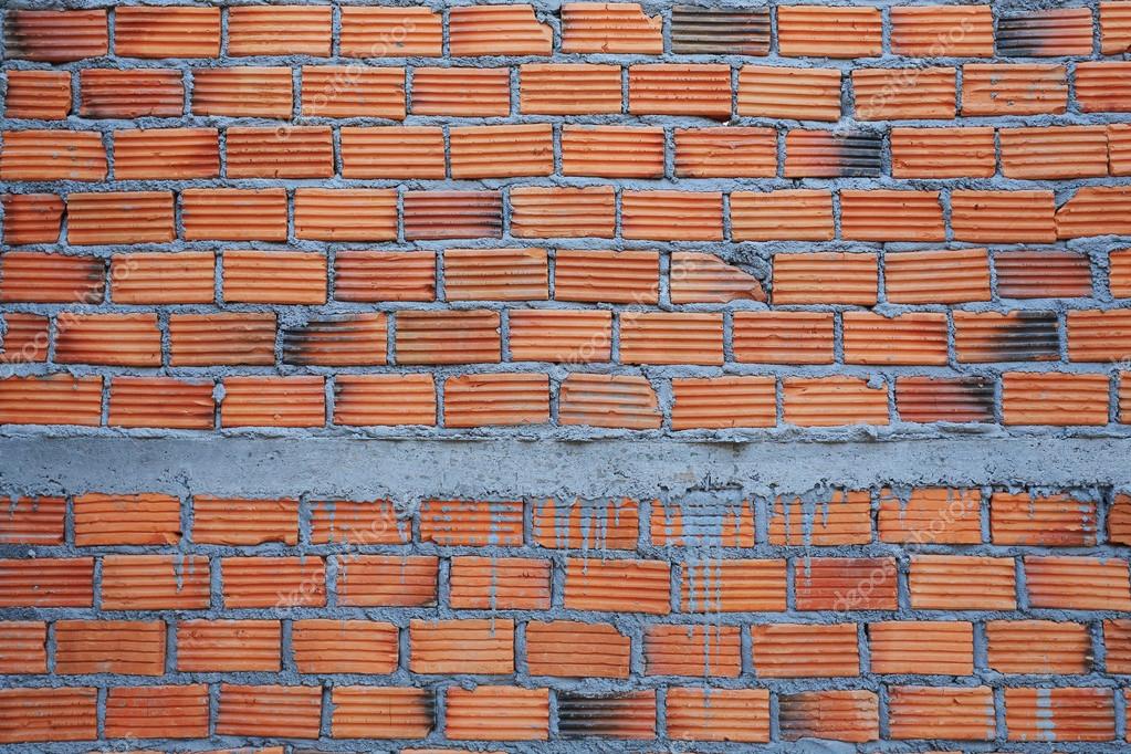 muro de ladrillo en la construcción de edificios residenciales 2022