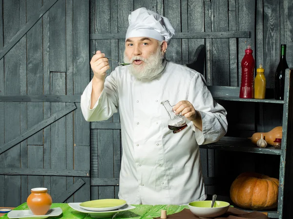 Man mature cook posing cooking apron. Fine recipe. Chief cook and ...