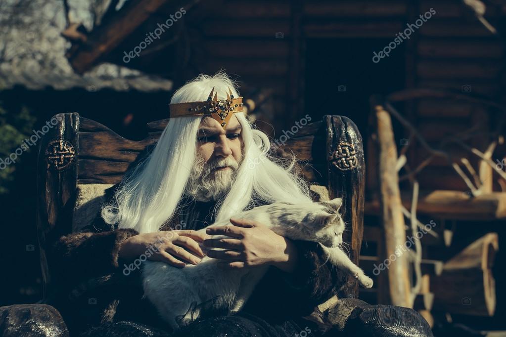 Old druid sits in chair Stock Photo by ©Tverdohlib.com 113935978