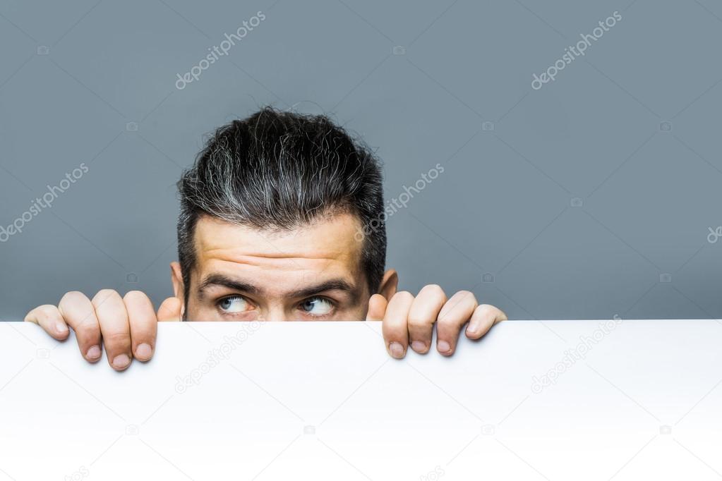 Scared man with paper Stock Photo by ©Tverdohlib.com 114148662