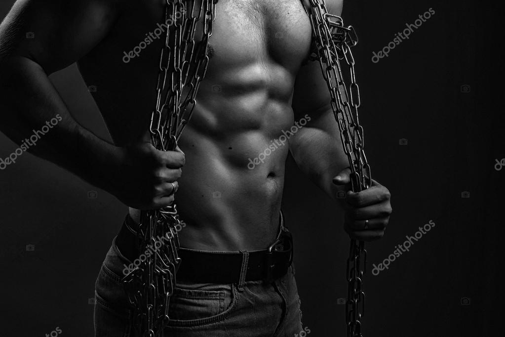 Muscular man with rope Stock Photo by ©Tverdohlib.com 122644758