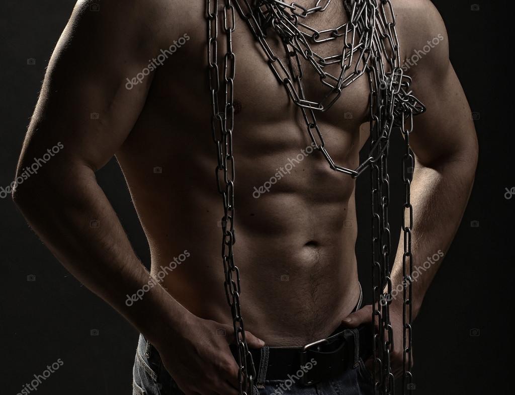 Muscular man with rope Stock Photo by ©Tverdohlib.com 122651076