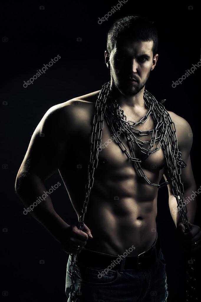 Muscular man with rope Stock Photo by ©Tverdohlib.com 89887166