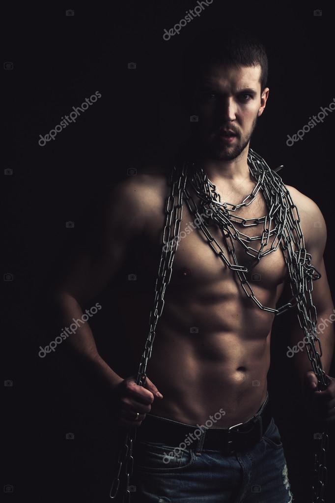 Muscular man with rope Stock Photo by ©Tverdohlib.com 90681692