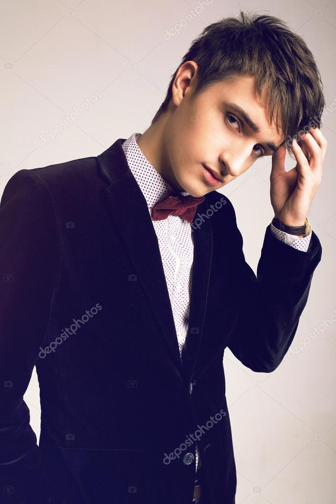 Man in stylish suit and bow tie — Stock Photo © AnnHaritonenko #79458626