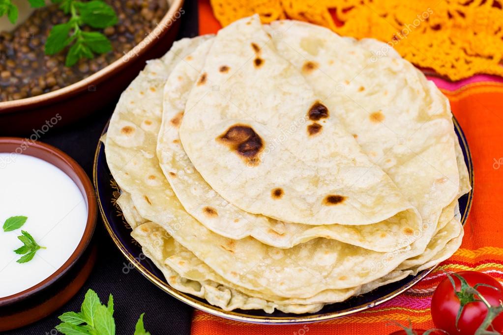 Indian flatbread chapati or roti Stock Photo by ©larik_malasha 115014336
