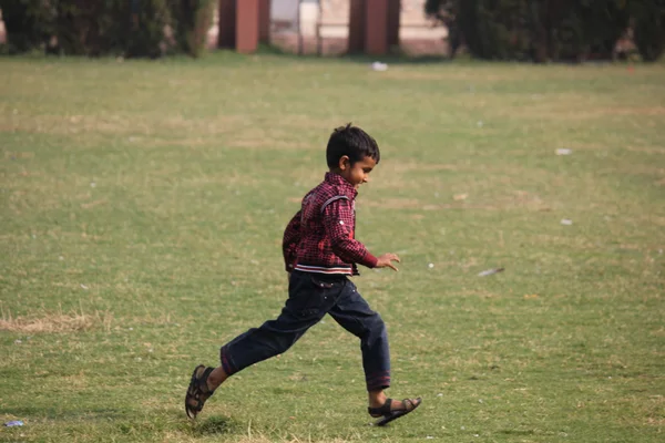 Indian kids running Stock Photos, Royalty Free Indian kids running ...