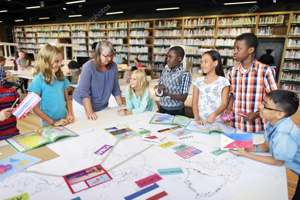 Pupils having lesson at school — Stock Photo © Rawpixel #105448806