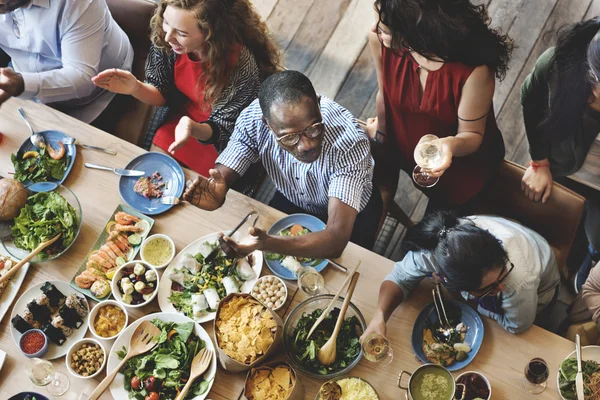 People enjoying food — Stock Photo © Rawpixel #128631872