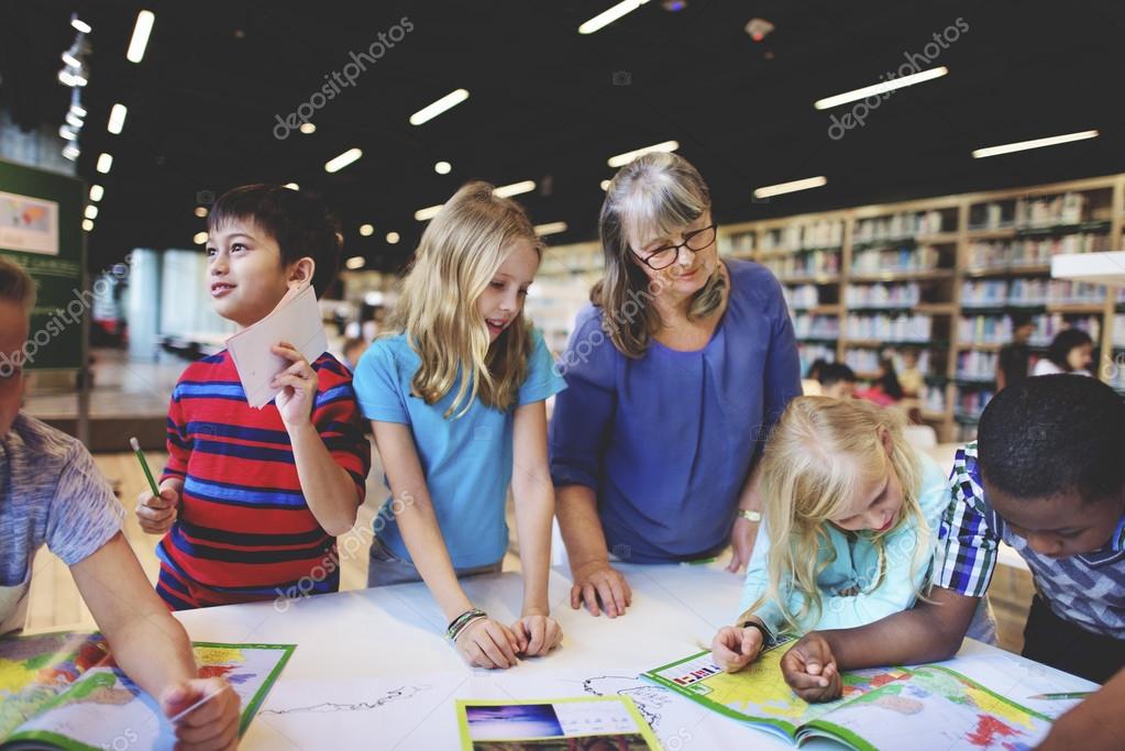 Pupils having lesson at school — Stock Photo © Rawpixel #106436900