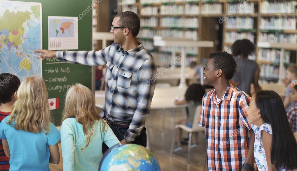 Pupils having lesson at school — Stock Photo © Rawpixel #106443442