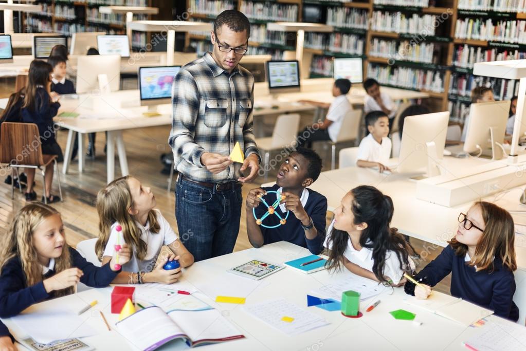 Pupils having lesson at school — Stock Photo © Rawpixel #107767318