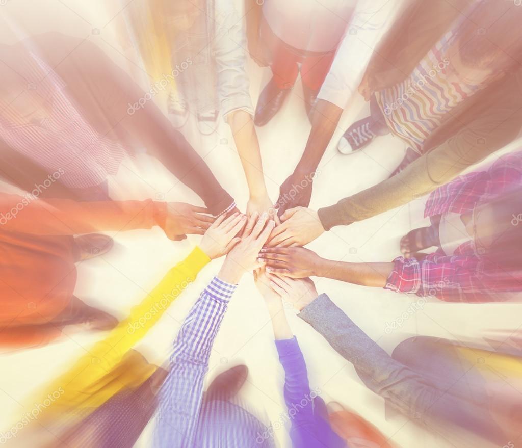 Diverse people holding hands — Stock Photo © Rawpixel #112097144