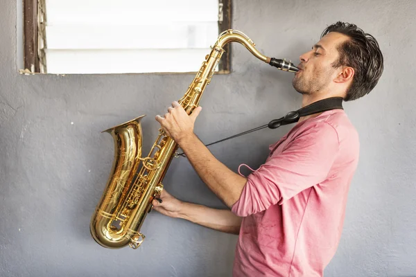 Young man with Saxophone Stock Photo by ©Rawpixel 128515058