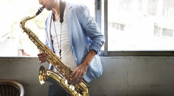 Young man with Saxophone Stock Photo by ©Rawpixel 128515058