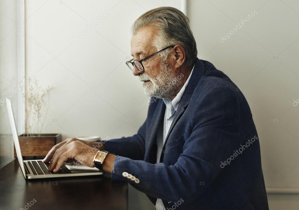 Handsome businessman in cafe — Stock Photo © Rawpixel #117558946 Handsome businessman in cafe — Stock Photo © Rawpixel #117558946