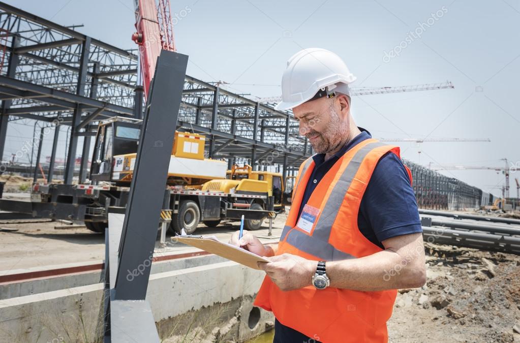 Engineer Worker writing building plan — Stock Photo © Rawpixel #125493260