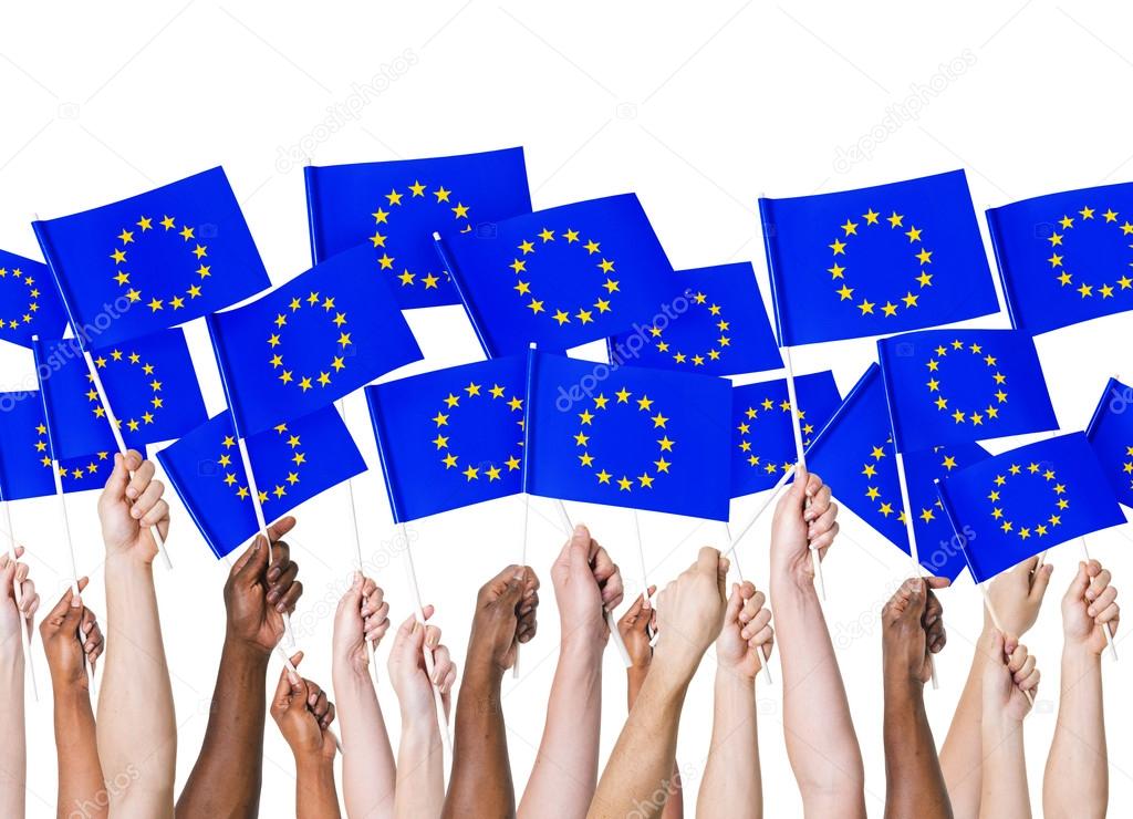 Hands raised and holding EU Flag — Stock Photo © Rawpixel #52453599