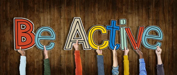 Hands Holding Words Be Active - Stock Image - Everypixel
