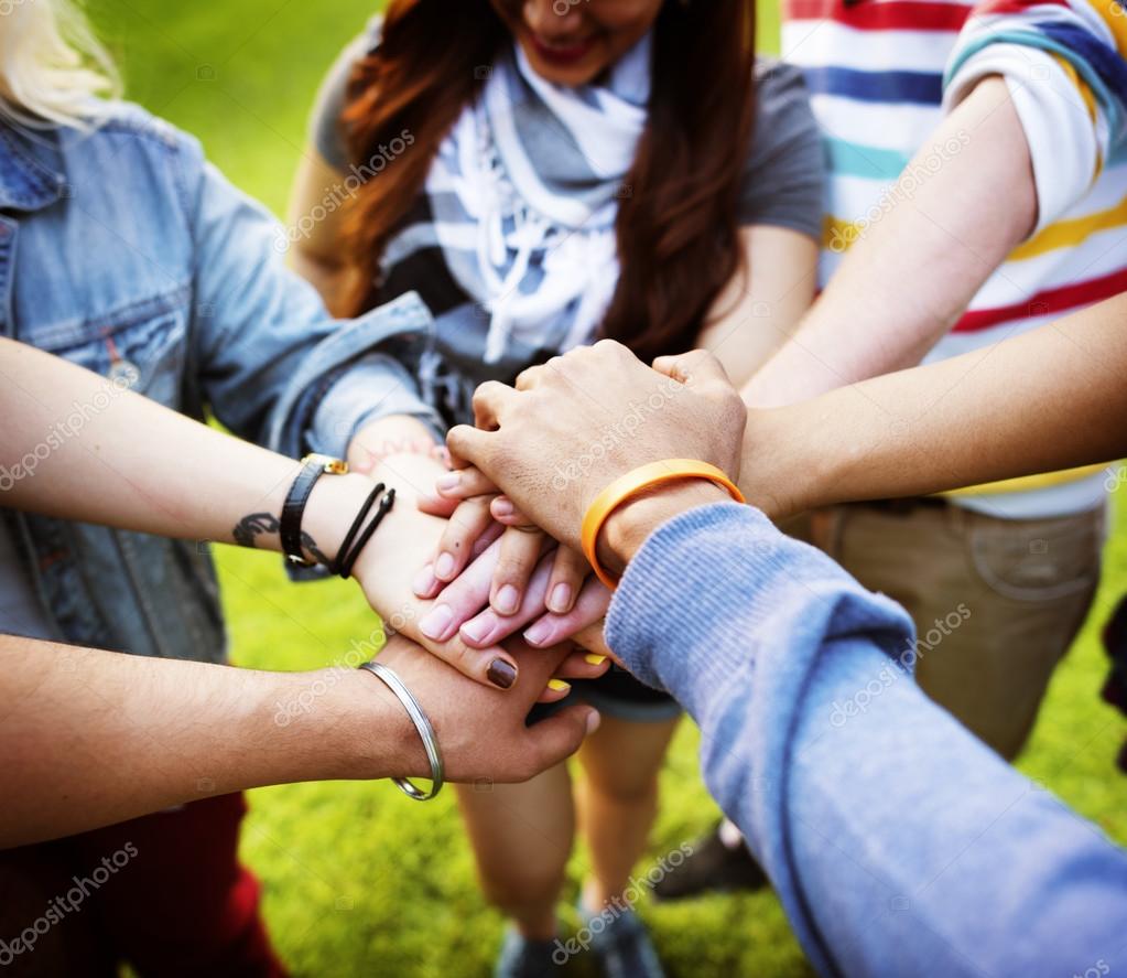 Young students making unity gesture — Stock Photo © Rawpixel #86441800