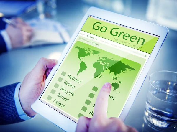 Tablet screen with Go Green - Stock Image - Everypixel