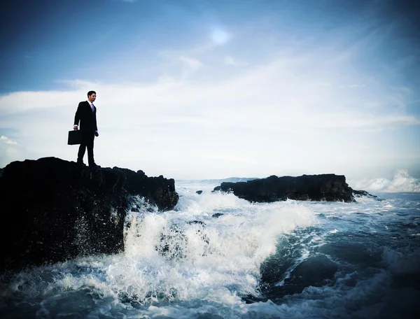 Businessman staying alone on island Stock Photo by ©Rawpixel 52468351