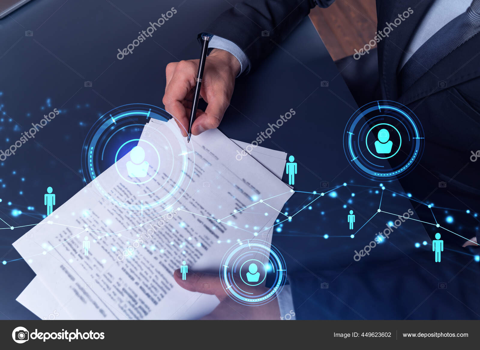A potential employee in formal suit signing the contract to boost his ...
