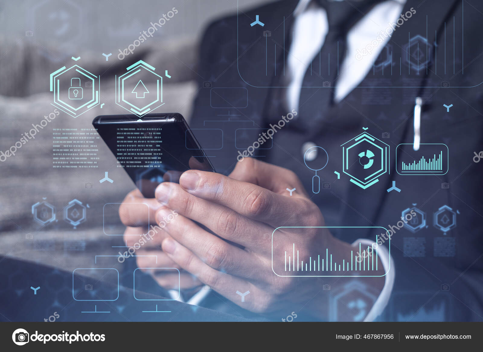 Programmer holding in the hands a smart phone and testing an innovative ...