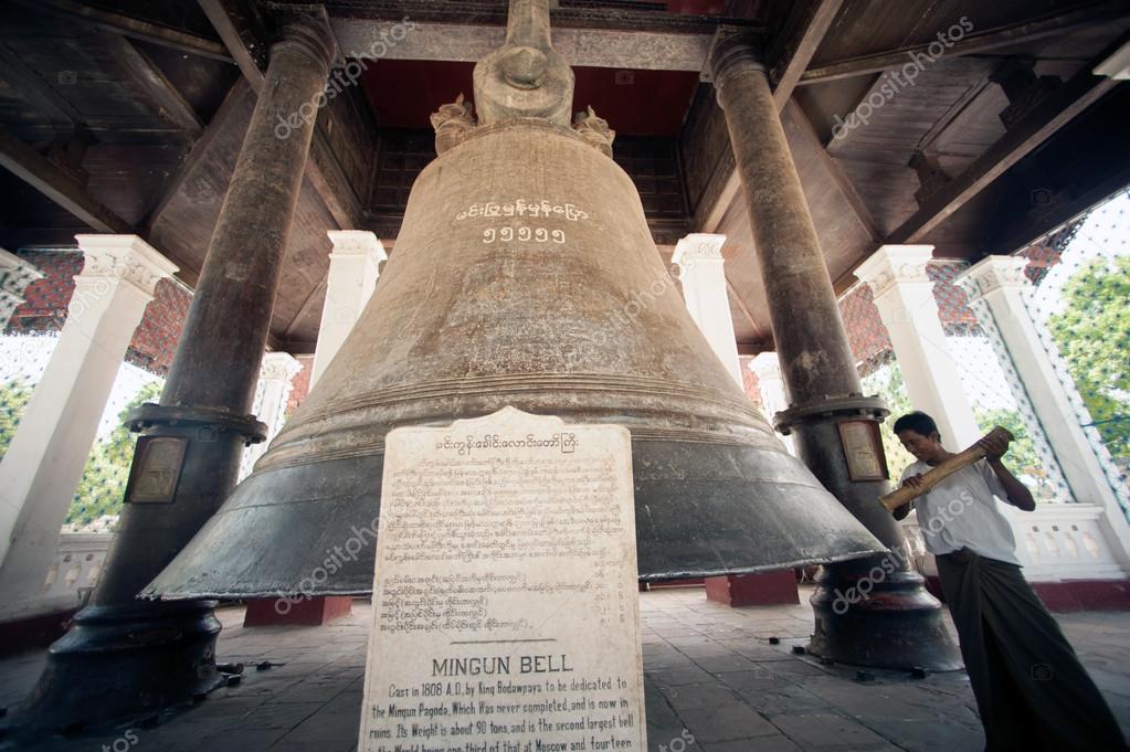 Man hitting the Mingun bell in Myanmar. — Stock Photo © topten22photo ...