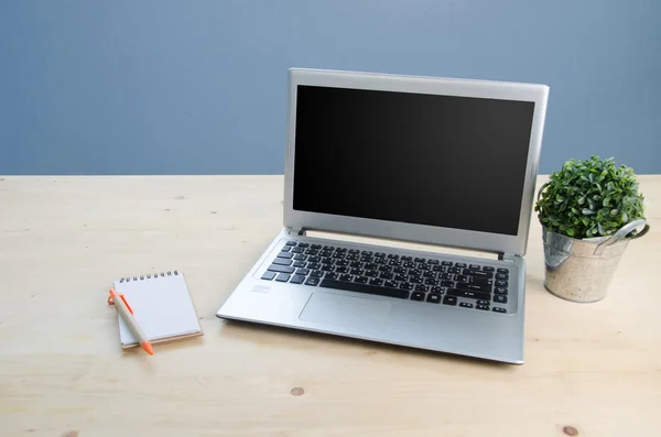 Office table with notepad, computer and equipment office. View f ...