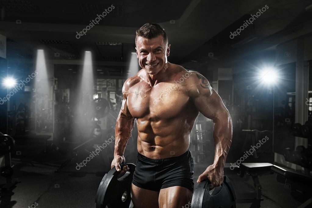 Bodybuilder muscle Athlete training with weight in gym — Stock Photo ...
